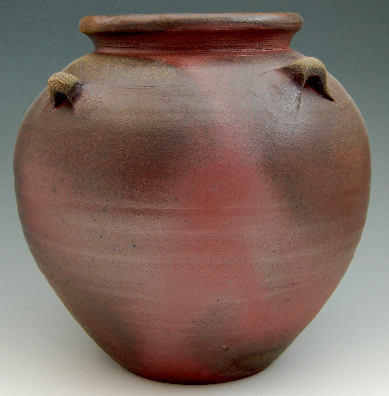 wood fired pottery: Two Tsubo and a Chawan made from a mid fire red clay.