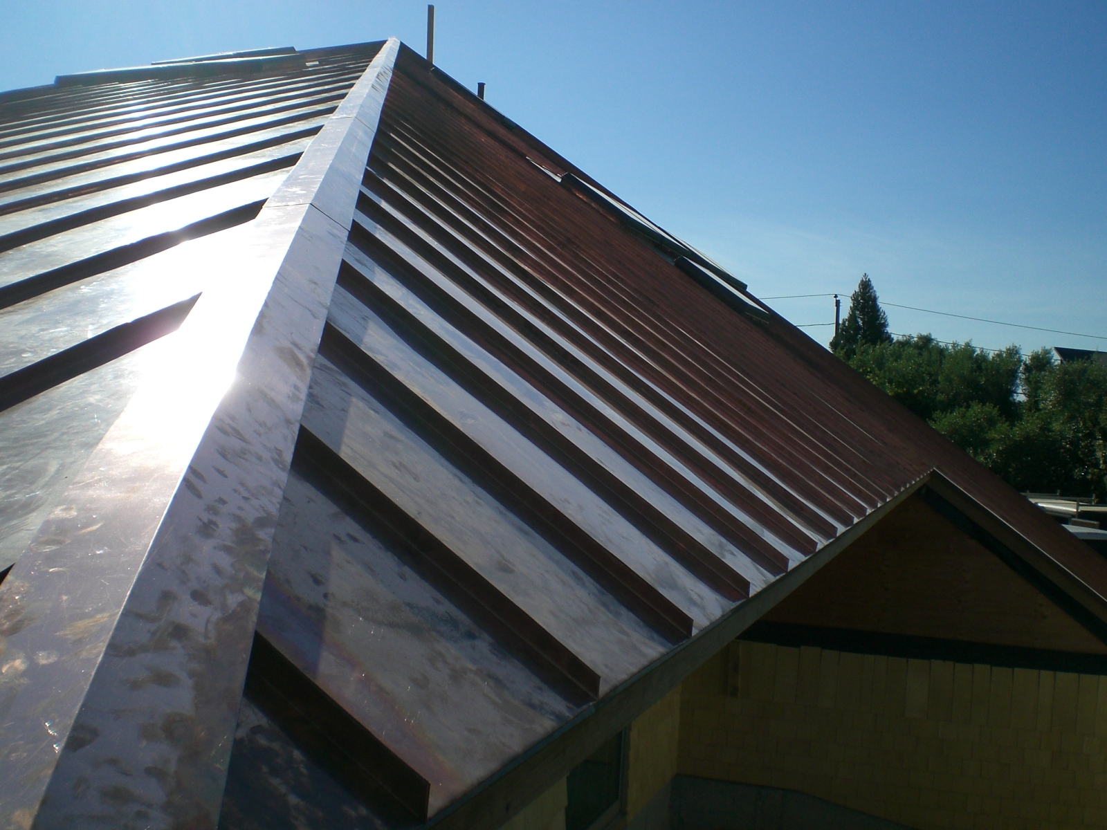 Architectural Sheet Metal Work: Copper roof, standing seam addition.