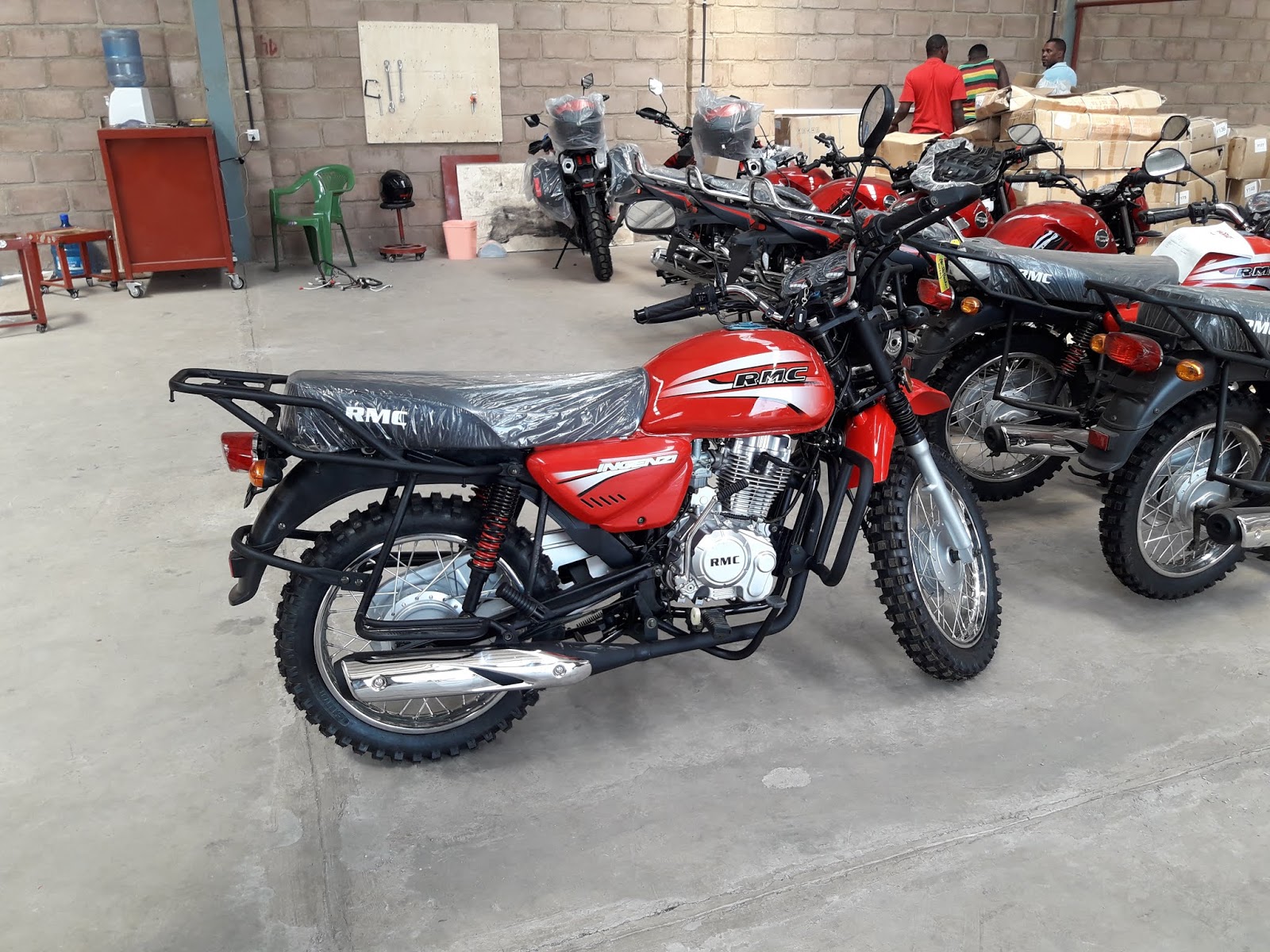 Kigali Keys: Building Pianos in Rwanda: Rwanda Motorcycle Company