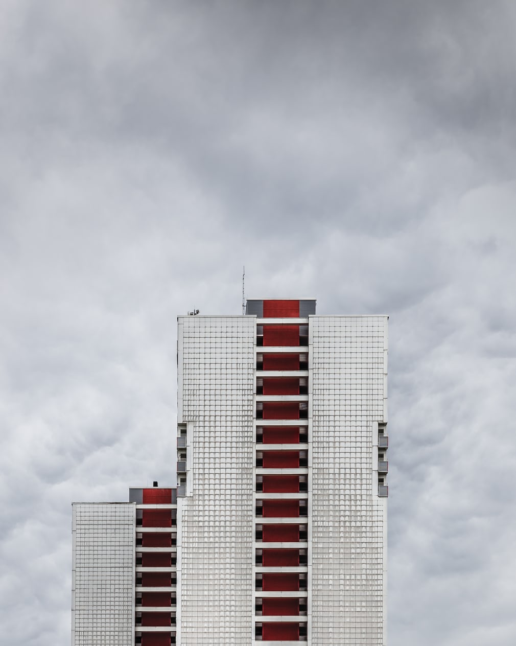 Grey concrete flats, generic office blocks, a grimly rising skyscraper