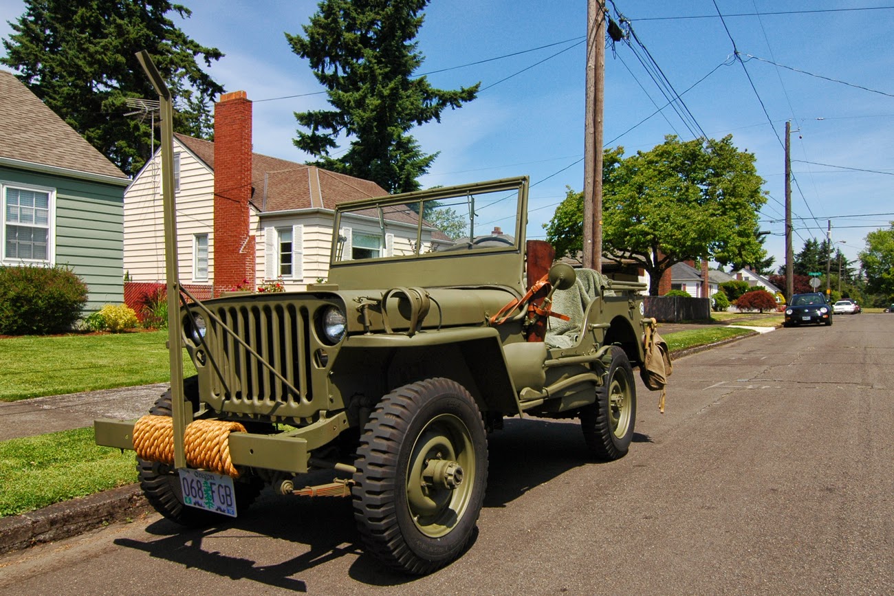 OLD PARKED CARS.: Three Jeeps Deep: 1942 Ford GPW.