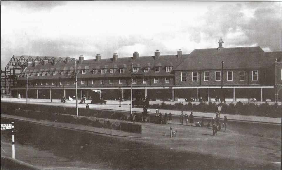 Dovecot Place shops in 1933 with the steelwork up for the construction ...