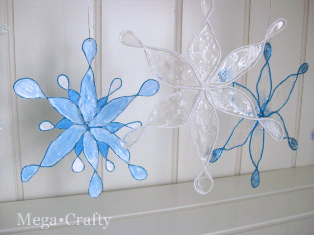 Mega•Crafty: Mod Podge Faux Stained Glass Snowflakes