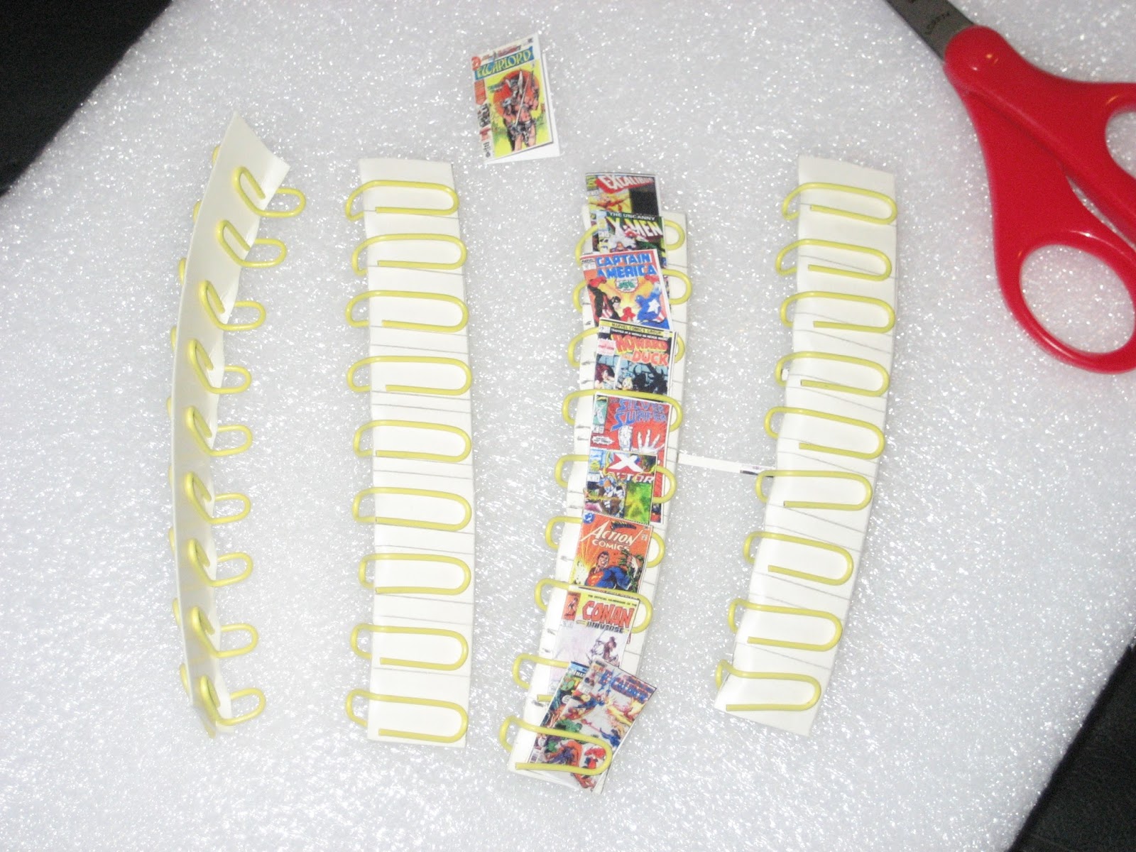 Random Happenstance: Build your own miniature comic book spinner rack!