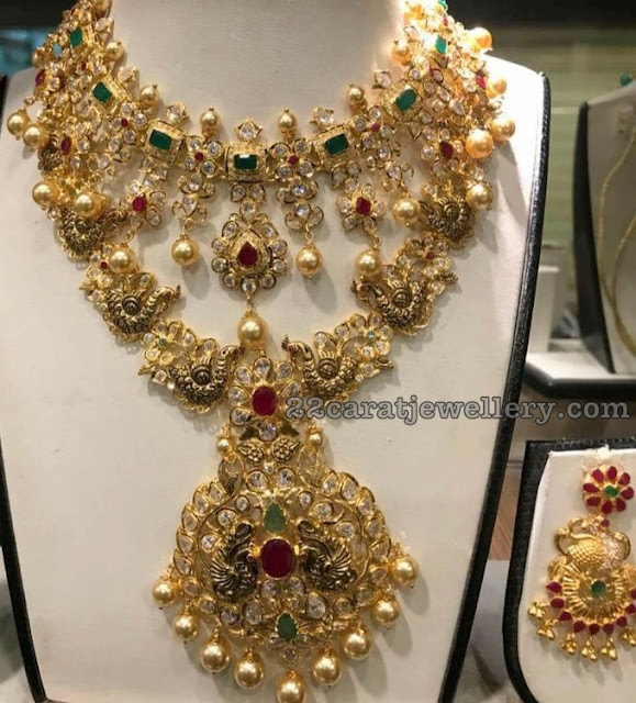 Peacock Long Chain with Heavy Locket - Jewellery Designs