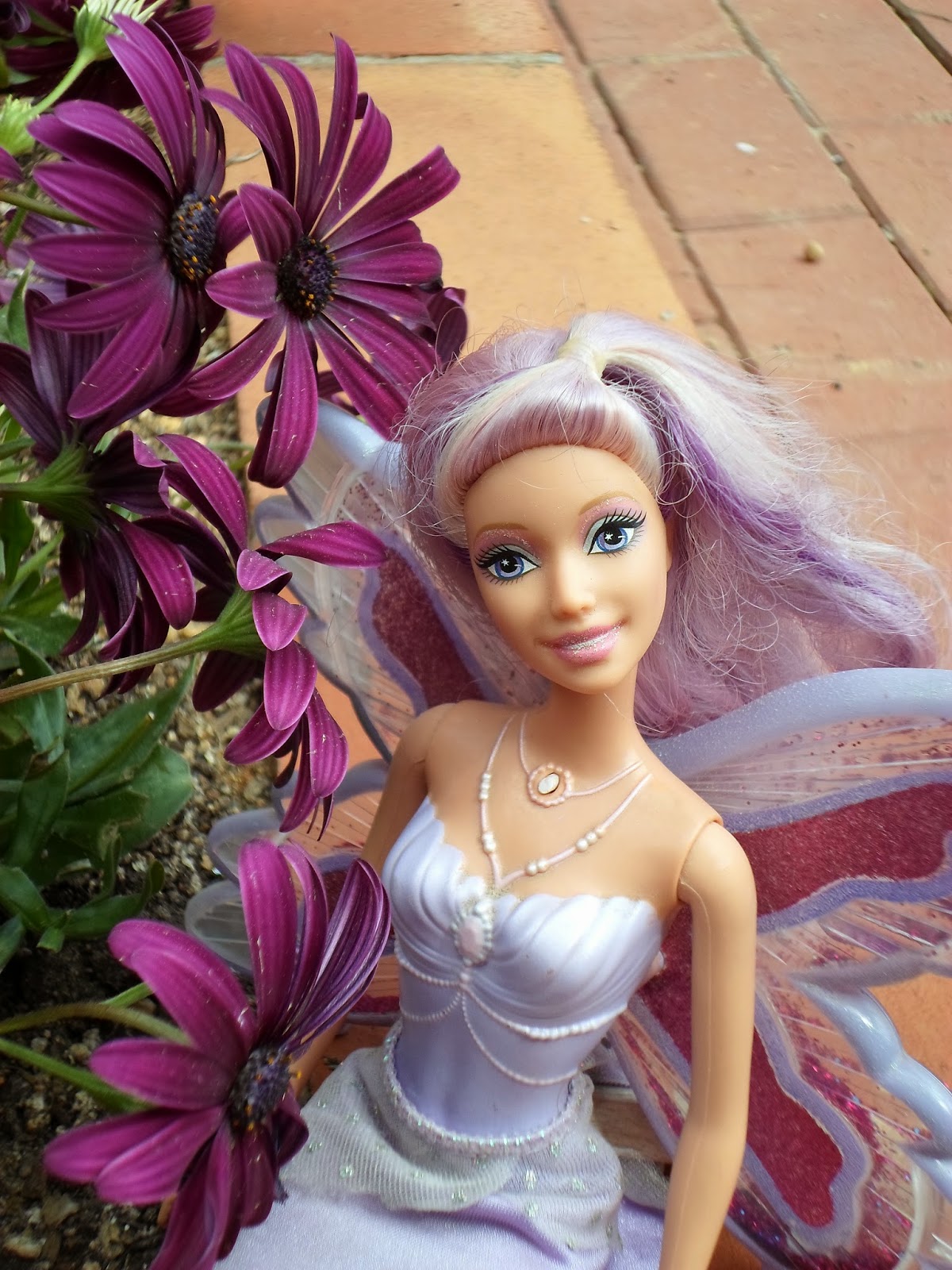 El rincón de mis muñecas: Barbie Glitter Swirl Fairy morada de la ...