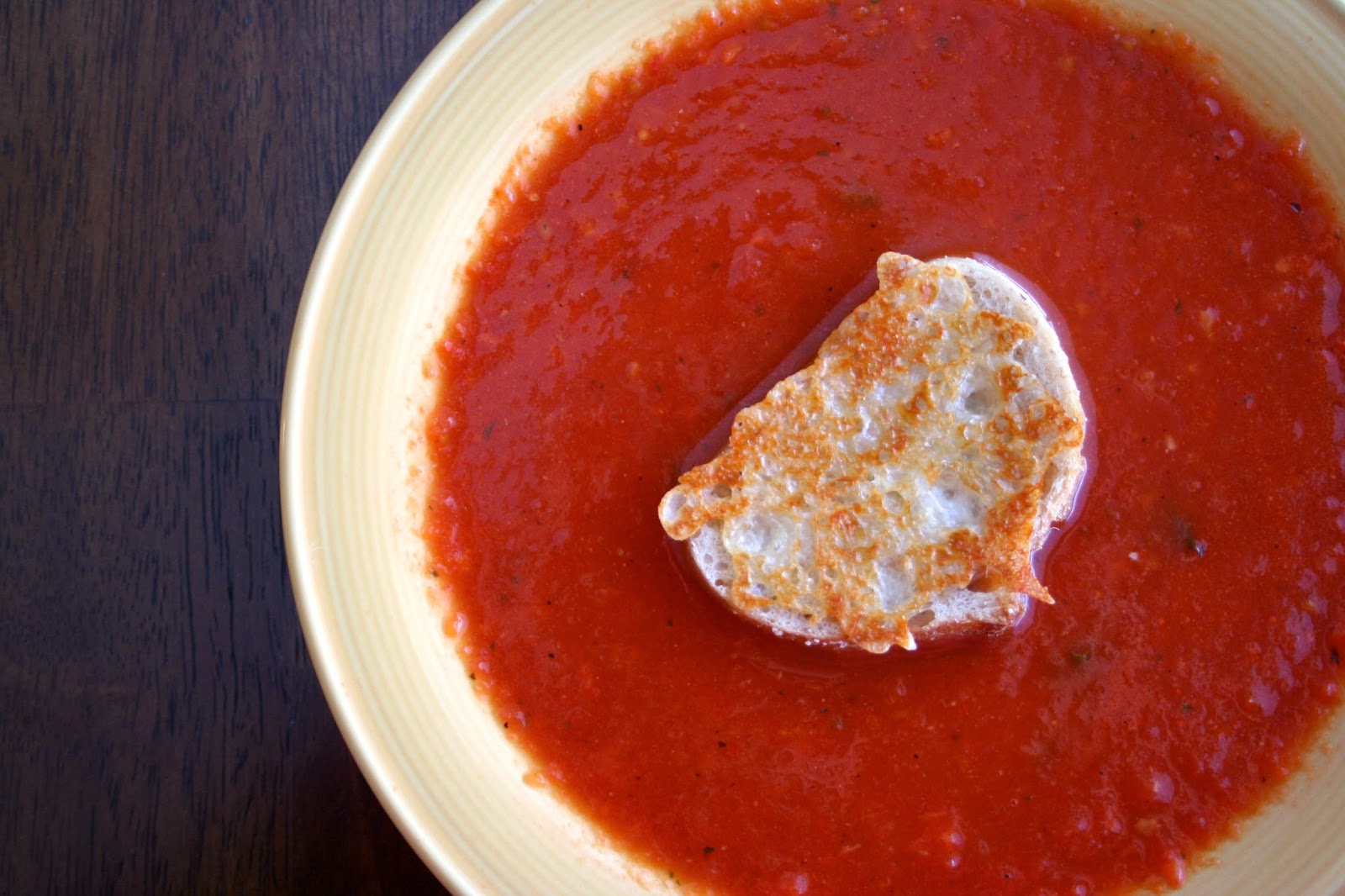 Hearty Tomato Soup with Parmesan-Crusted Croutons