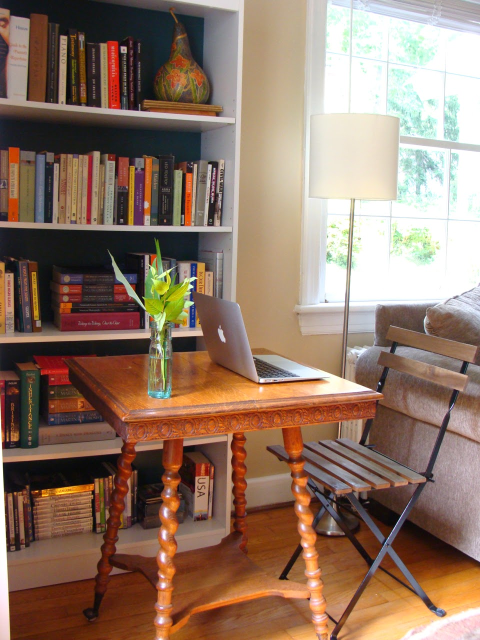Something Ivory: A Writing Nook Among Bookcases