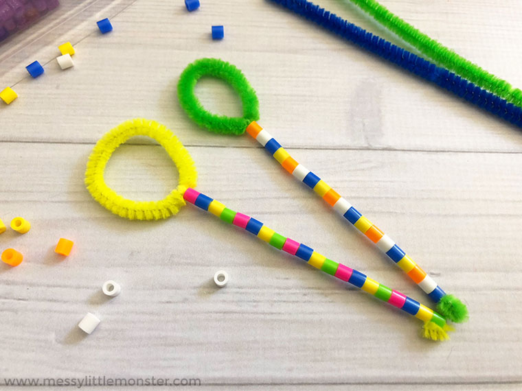 Homemade bubble wands for fun outdoor bubble play - Messy Little Monster