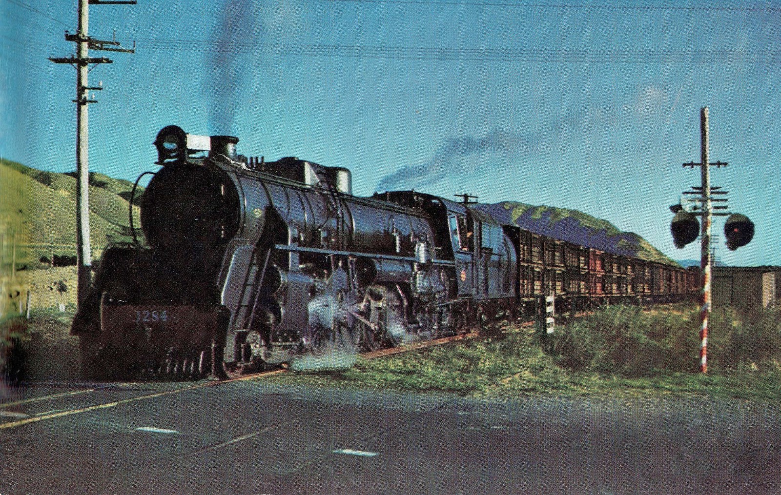 transpress nz: NZR Ja 1284 heads a northbound goods train across MacKay ...