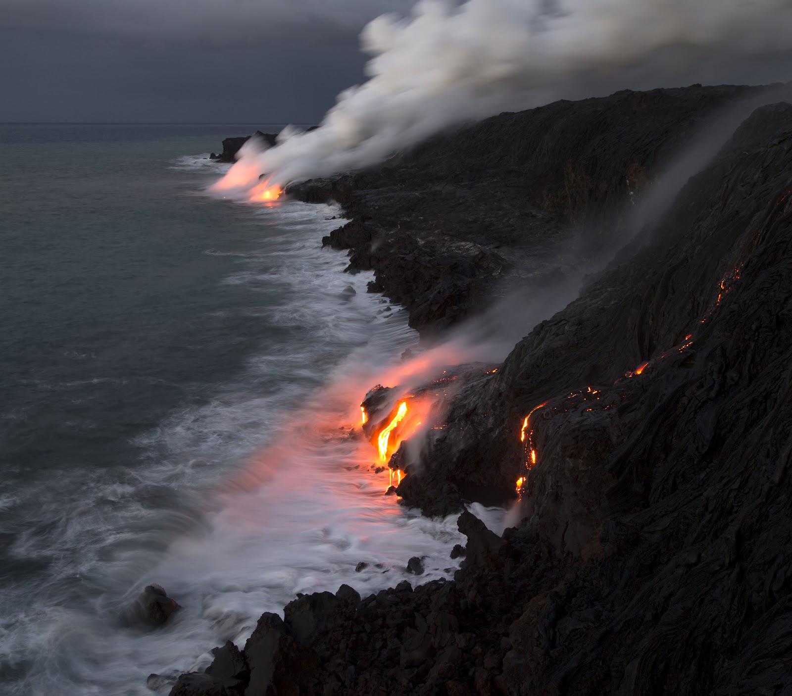 HAWAIIAN LAVA DAILY: Hawaiian molten lava continues from crater to sea
