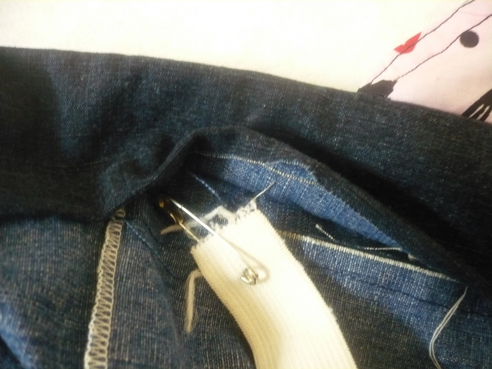 Sew along the waistband seam (ONLY IN THE BACK), as close to the seam ...