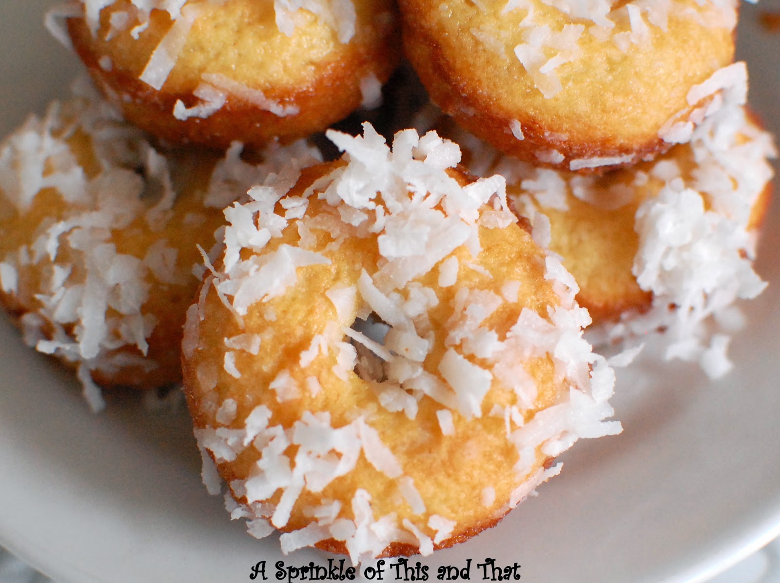A Sprinkle of This and That: Mini Baked Banana Coconut Donuts