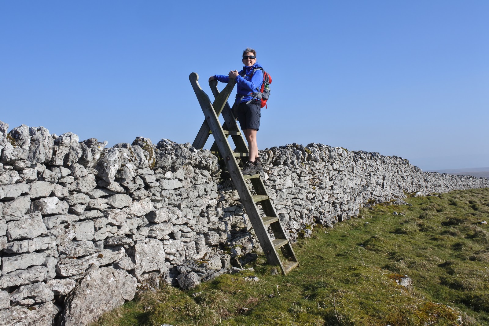 Great Asby limestone pavement, cairns and an OS trig point at the Knott ...