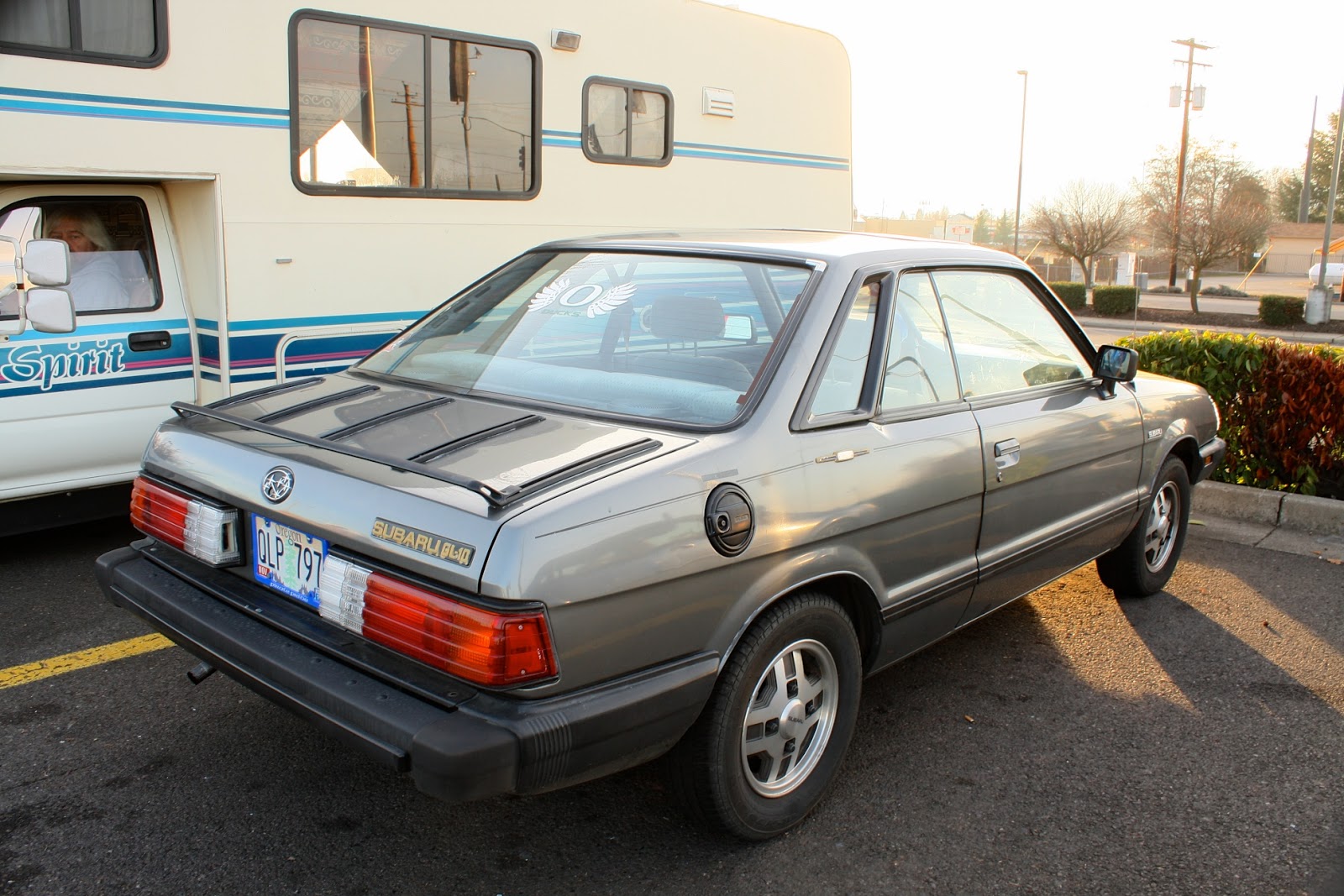 OLD PARKED CARS.: 1983 Subaru GL-10.