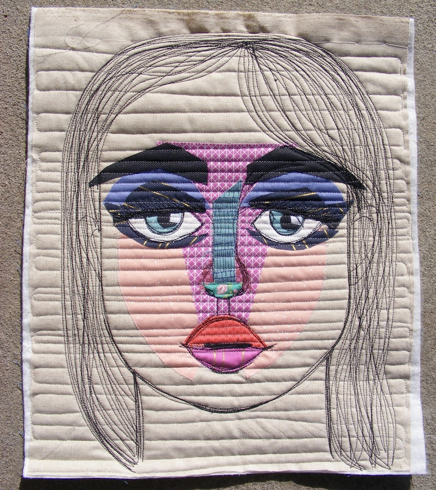 TIA CURTIS QUILTS: I have also been making faces.