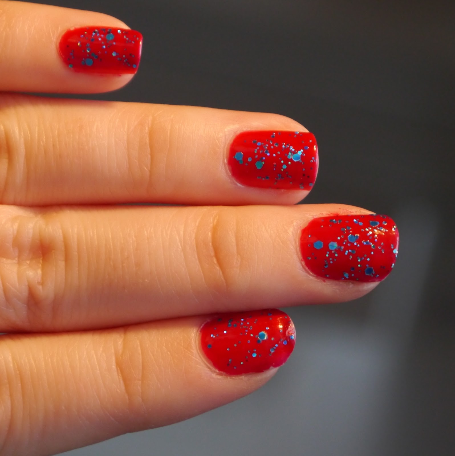 Sew Here's The Bling : Nail Inspiration, Red with Blue Glitter