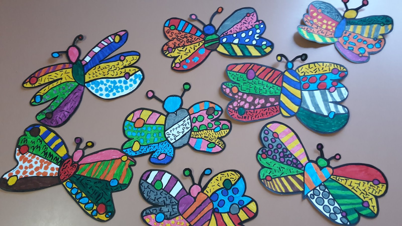 Amiscol: Des papillons comme Romero Britto