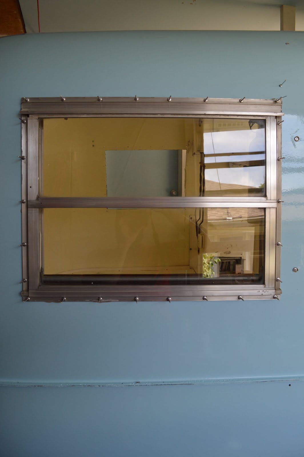 1975 Scamp Renovation: Replacing the parts...rivets, windows, and vents