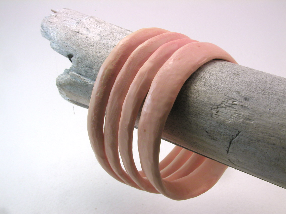 Knots and fiber bracelets: small stack of plastic faux bone bangle ...