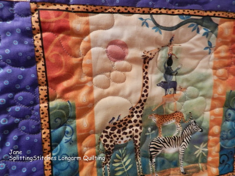 SplittingStitches Longarm Quilting: Quilt of the day...animal tracks!