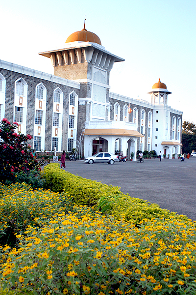 KOLHAPUR: "50 years onward march from region to global vision." Shivaji ...