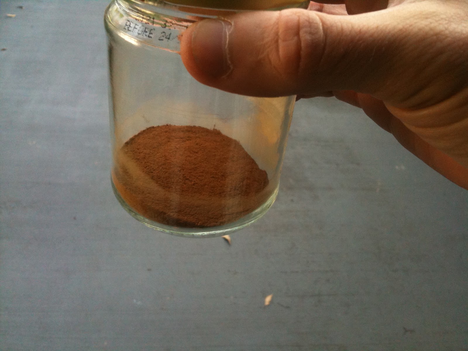 Making ochre paint by hand