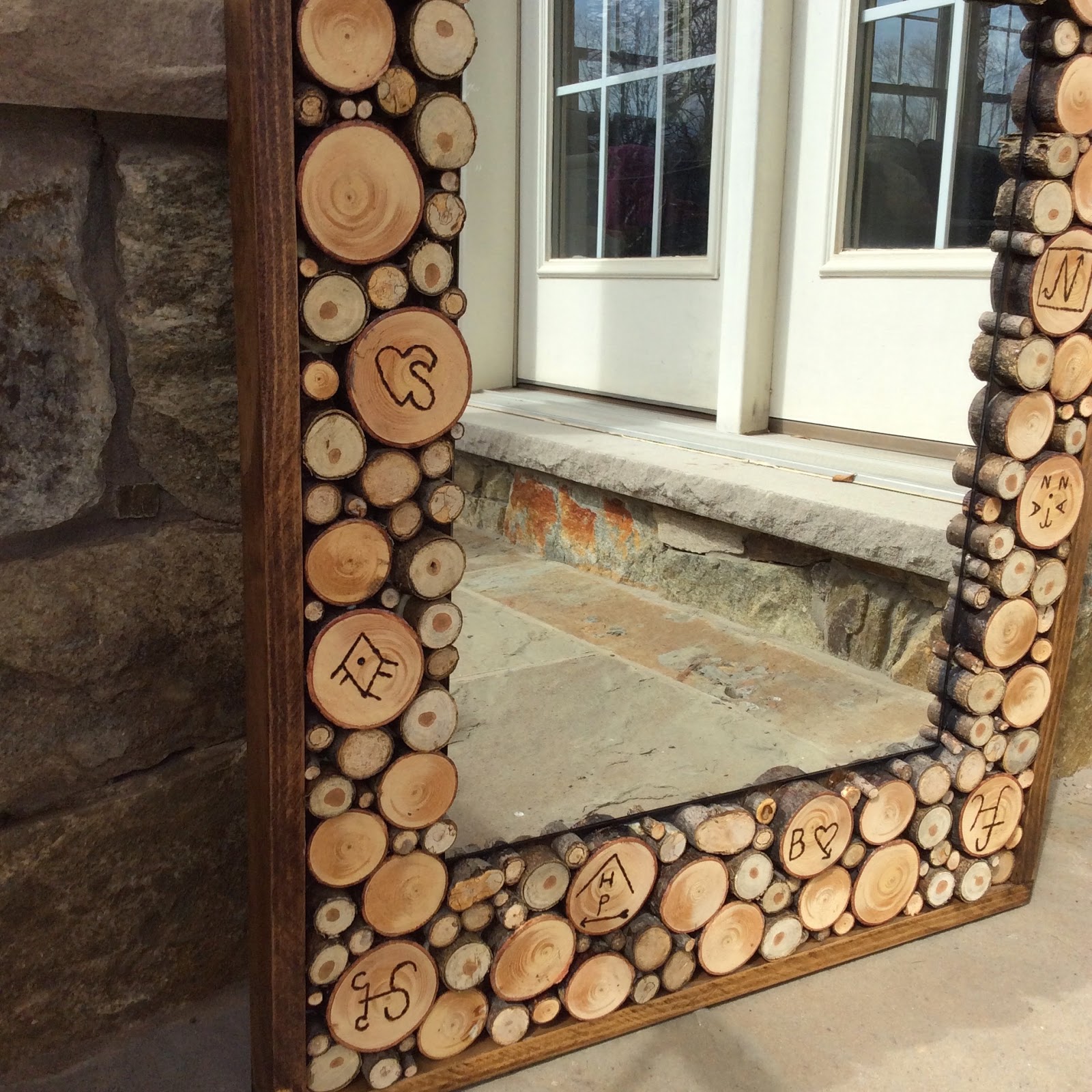 Lipstick and Sawdust: DIY mirror w/ wood slices and custom branding