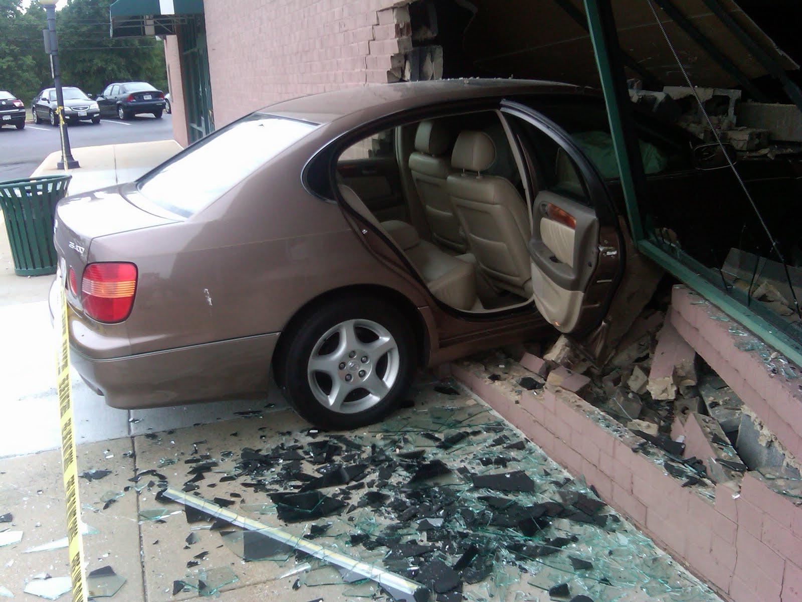 Car Crashes into Window of Commerical Building - No Injuries