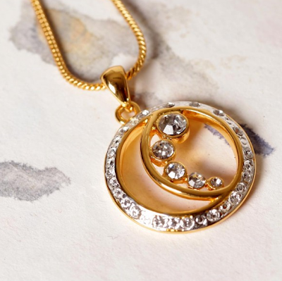 “Simplicity is the keynote of all true elegance.” : Gold Pendants For Girls
