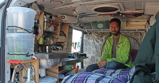 Rolling Steel Tent: A man in a tiny van