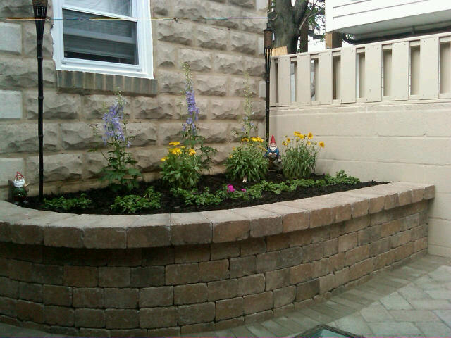 Custom Stoneworks & Design Inc.: Row Home backyard patio/wall in Canton