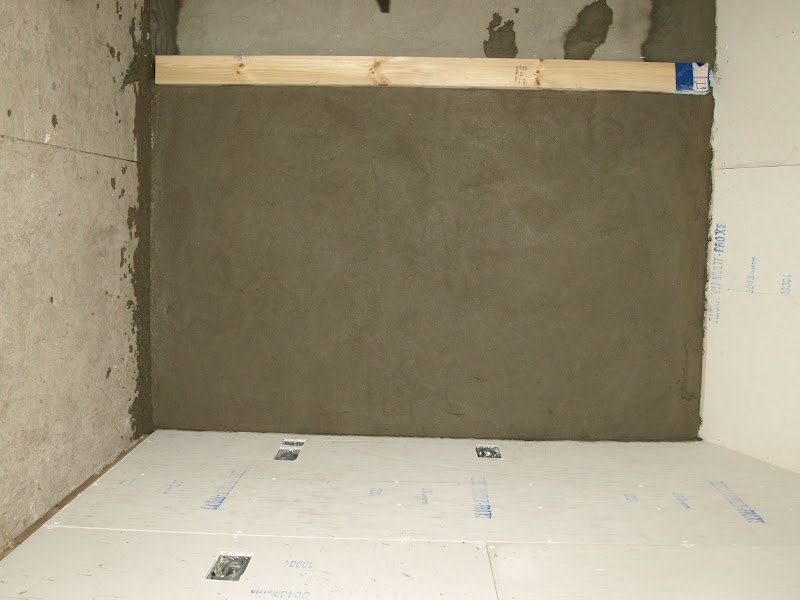 DESIGNED: TO BREATHE: Second coat of clay plaster