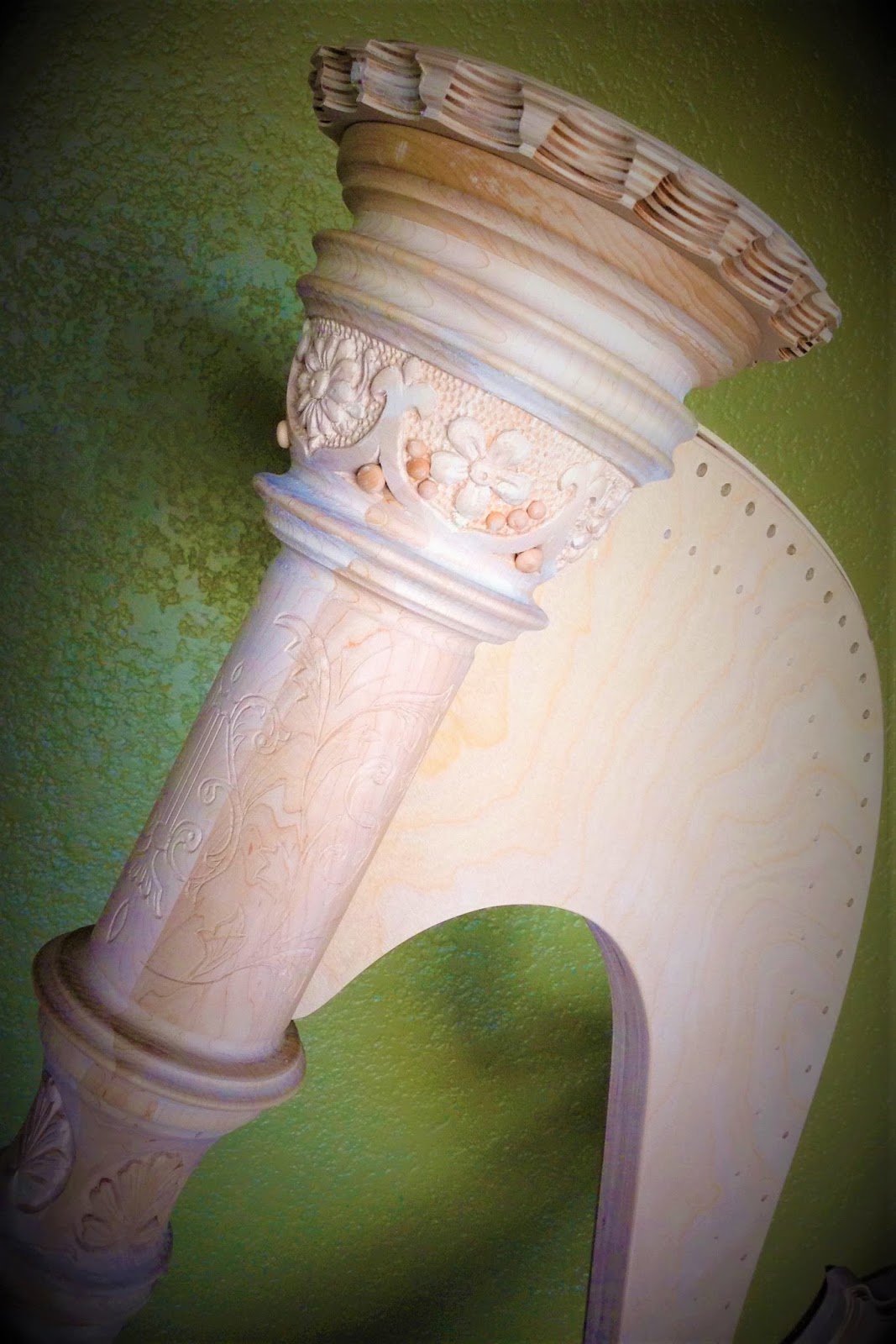 Center Stage Harps: Carving the Grand Tiara Pillar