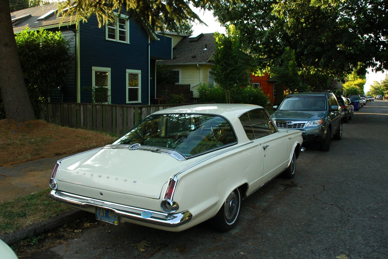 OLD PARKED CARS.: 1964 Plymouth Barracuda.