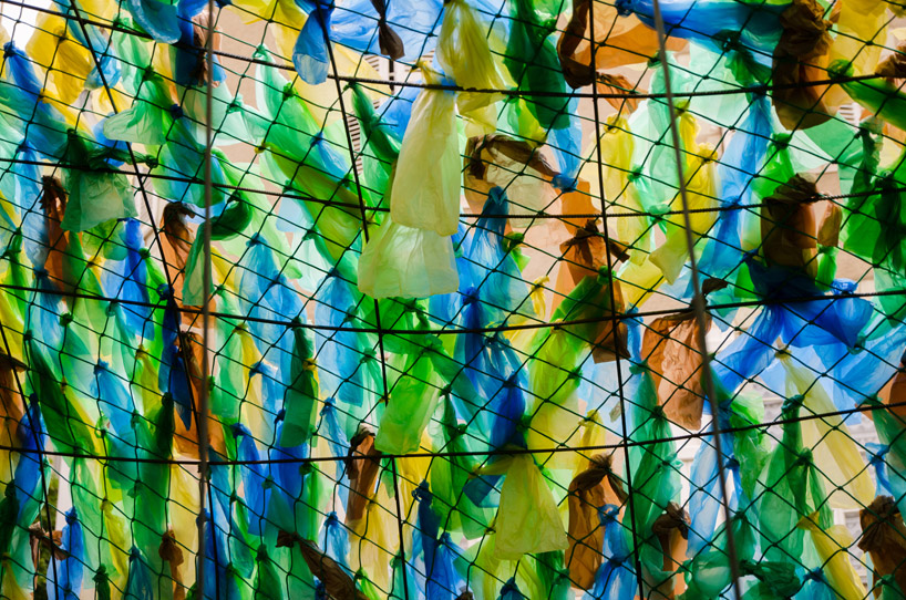 Kuweight 64: ART - GIANT COLORFUL SLUGS WITH PLASTIC BAGS