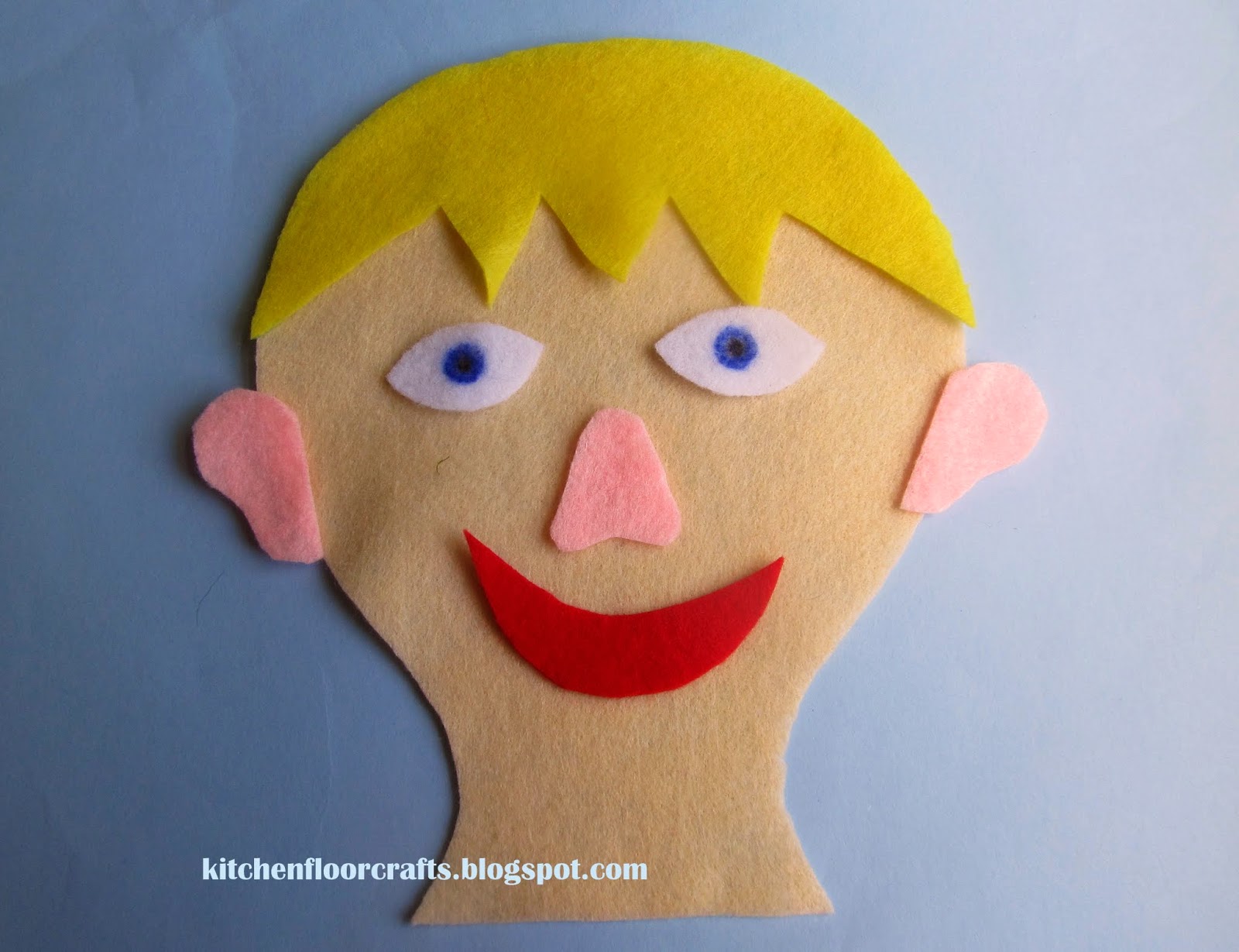 Kitchen Floor Crafts: Baby Faces Busy Bag (For a One Year Old)