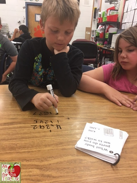 An Apple For The Teacher: Upside-Down Calculator Word Riddles Task Cards