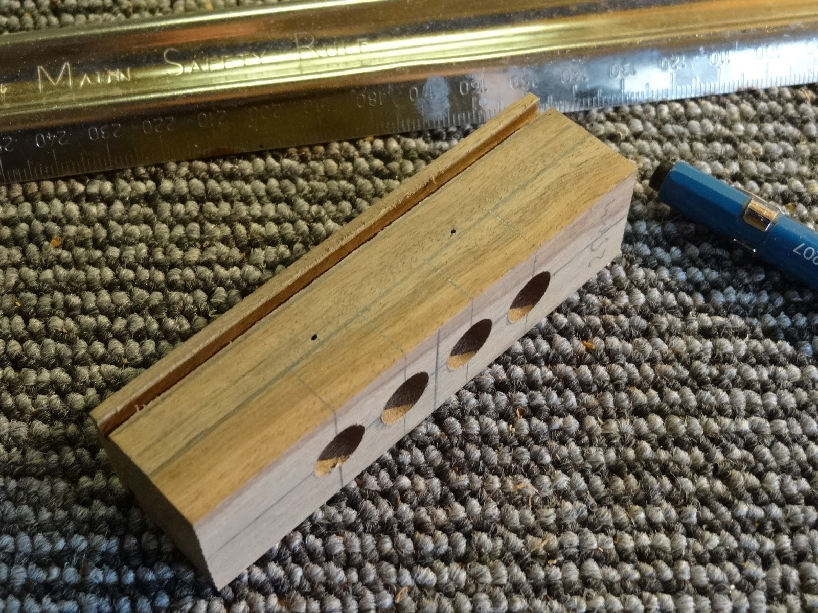 Shonky: How to make an easy string Ukulele Bridge.