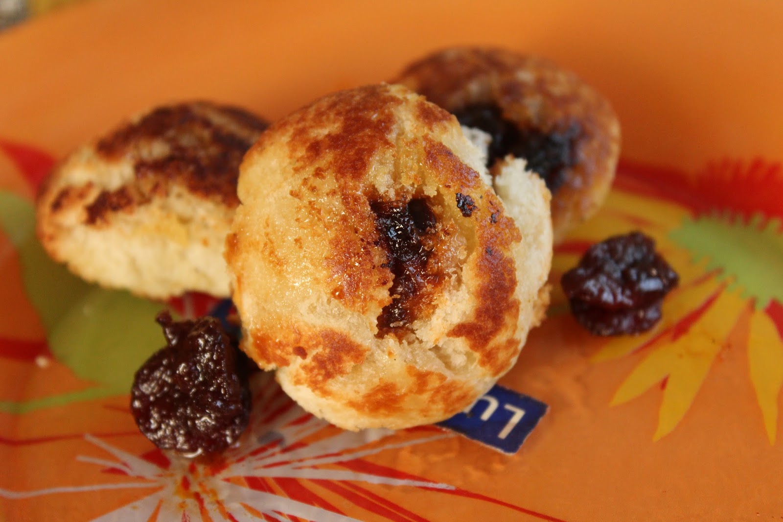 SPICY CRANBERRY JAM ROLLS AND BALLS