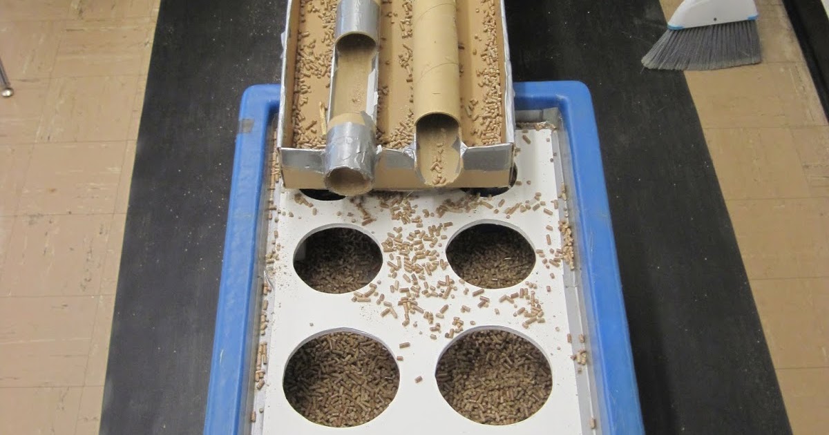 SAND AND WATER TABLES: Horizontal tubes bridging two sensory tables