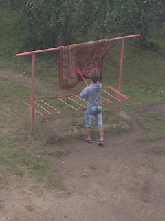 At Least One Picture A Day: August 21 2012 Rug Beating