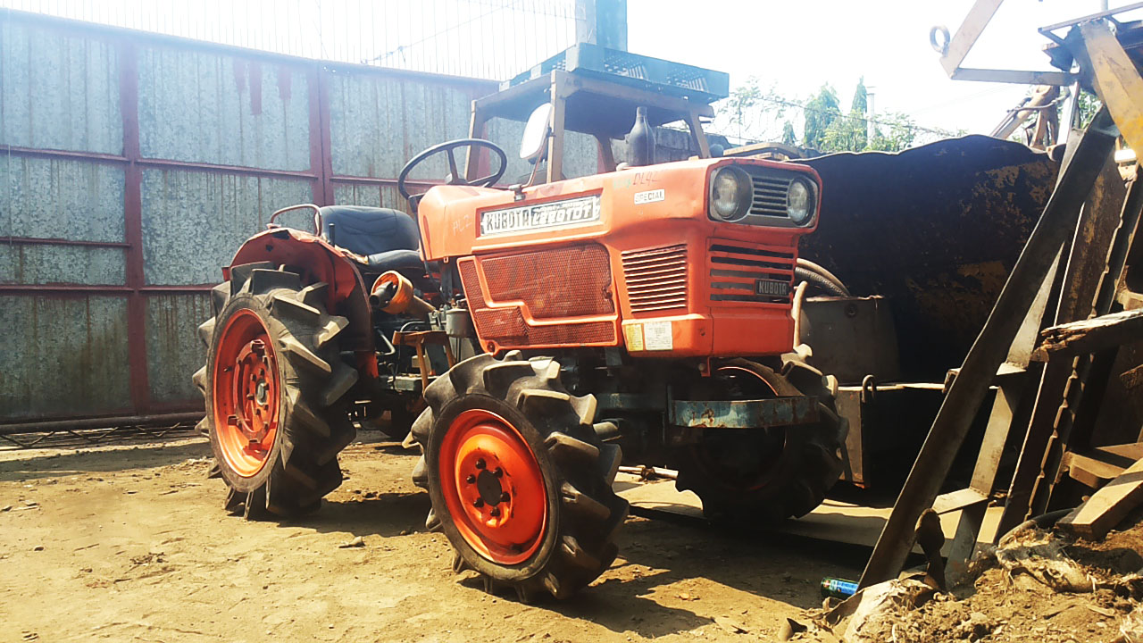 Products: kubota L2201DT farm tractor with tiller attachment