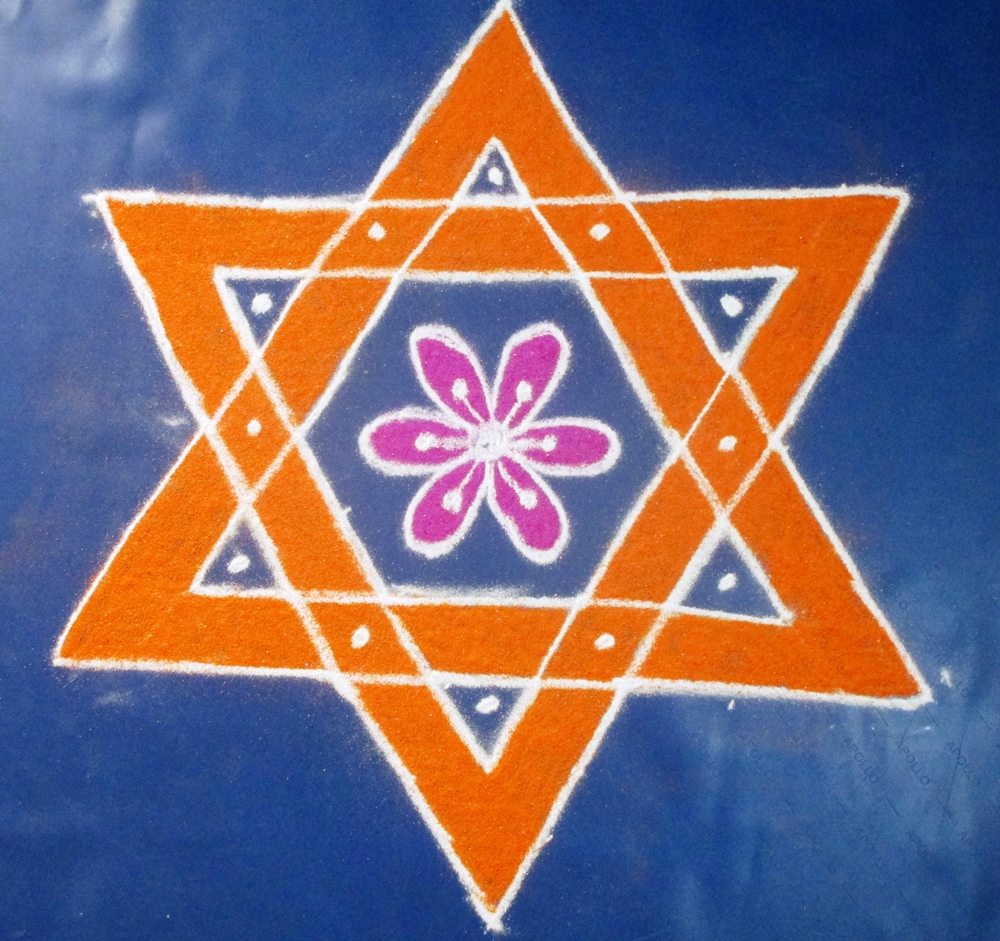 Kolam with dots - Rangoli & star design.