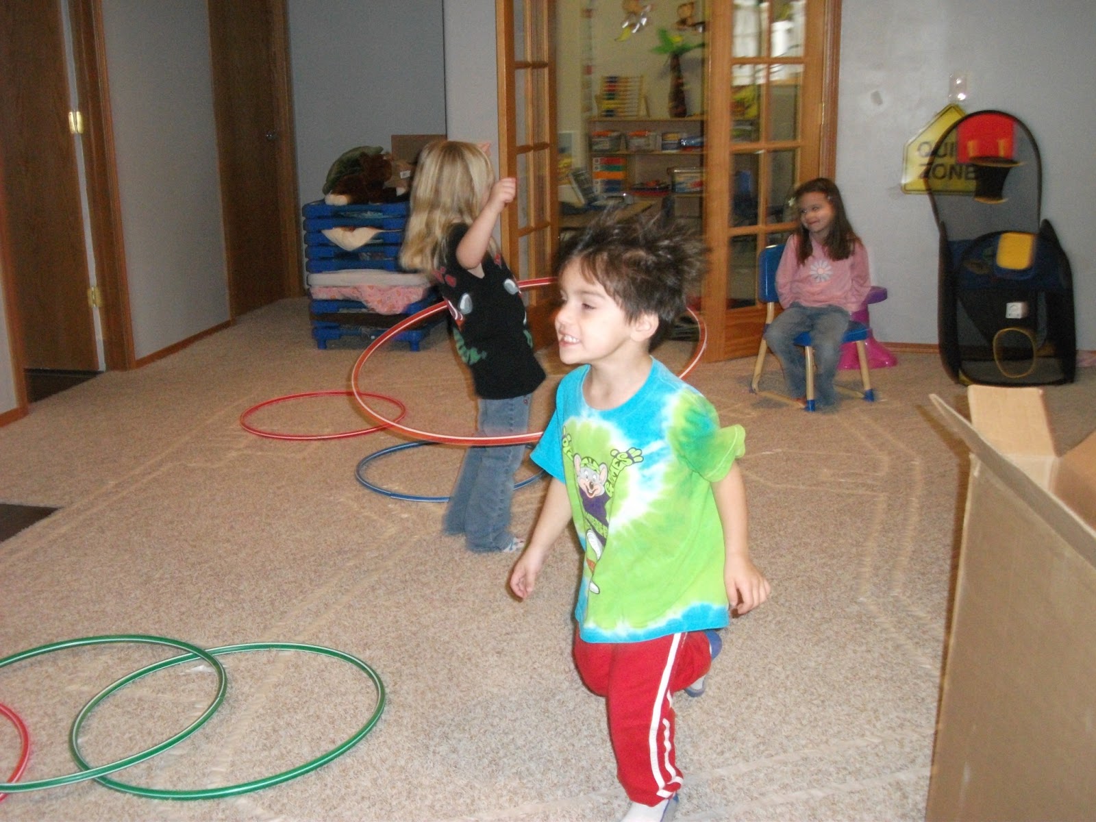 Little Foxes Childcare/Preschool: Practicing hoola hoops