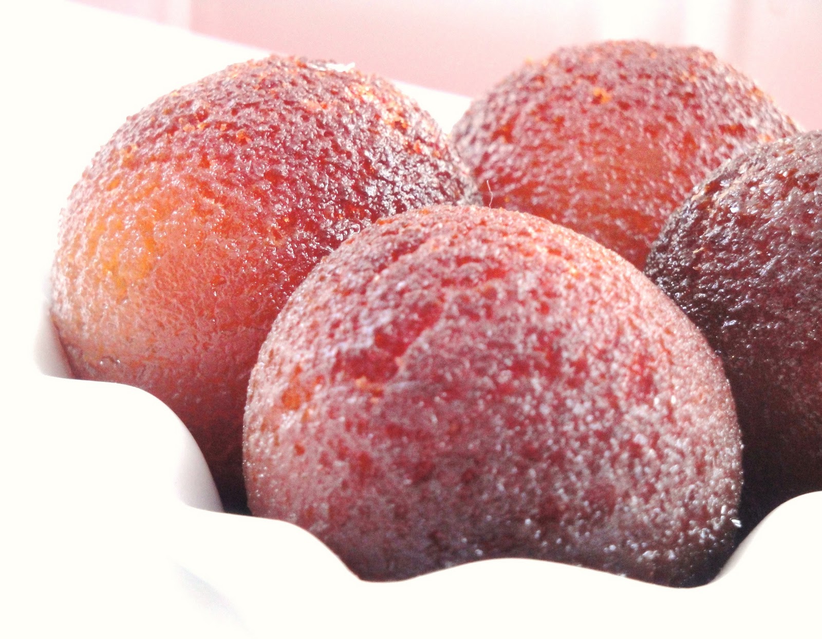 cumin and cardamom: Gulab Jamuns