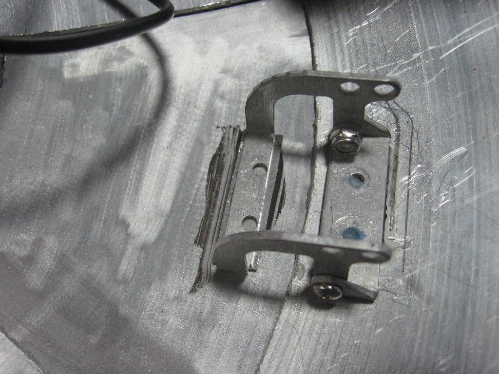 Paul's R2-D2 Project: Installing a hinge on the dome pie panels