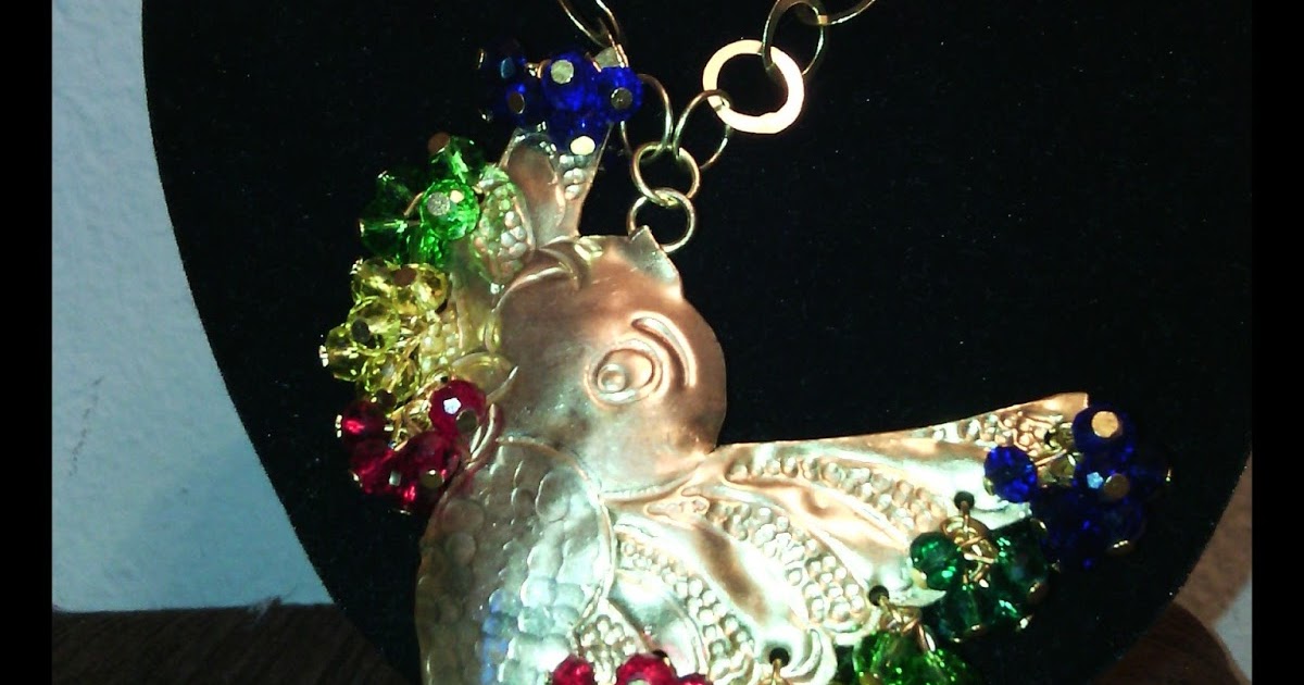 Créations de bijoux artisanaux et plaqué or en Tunisie: Un perroquet ...