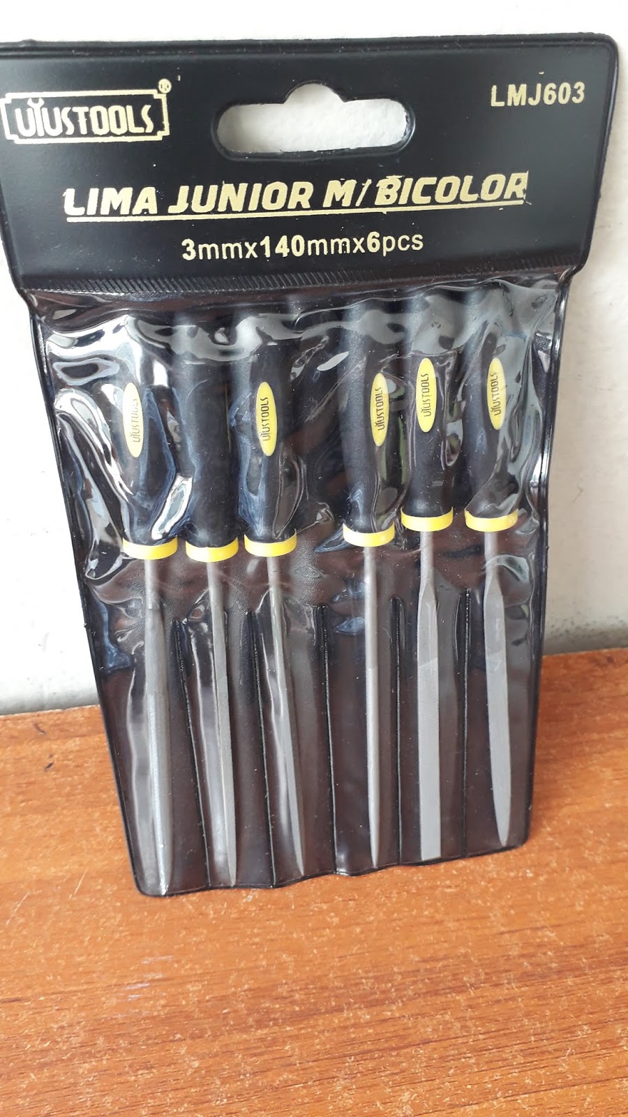 comercial arco y sierra