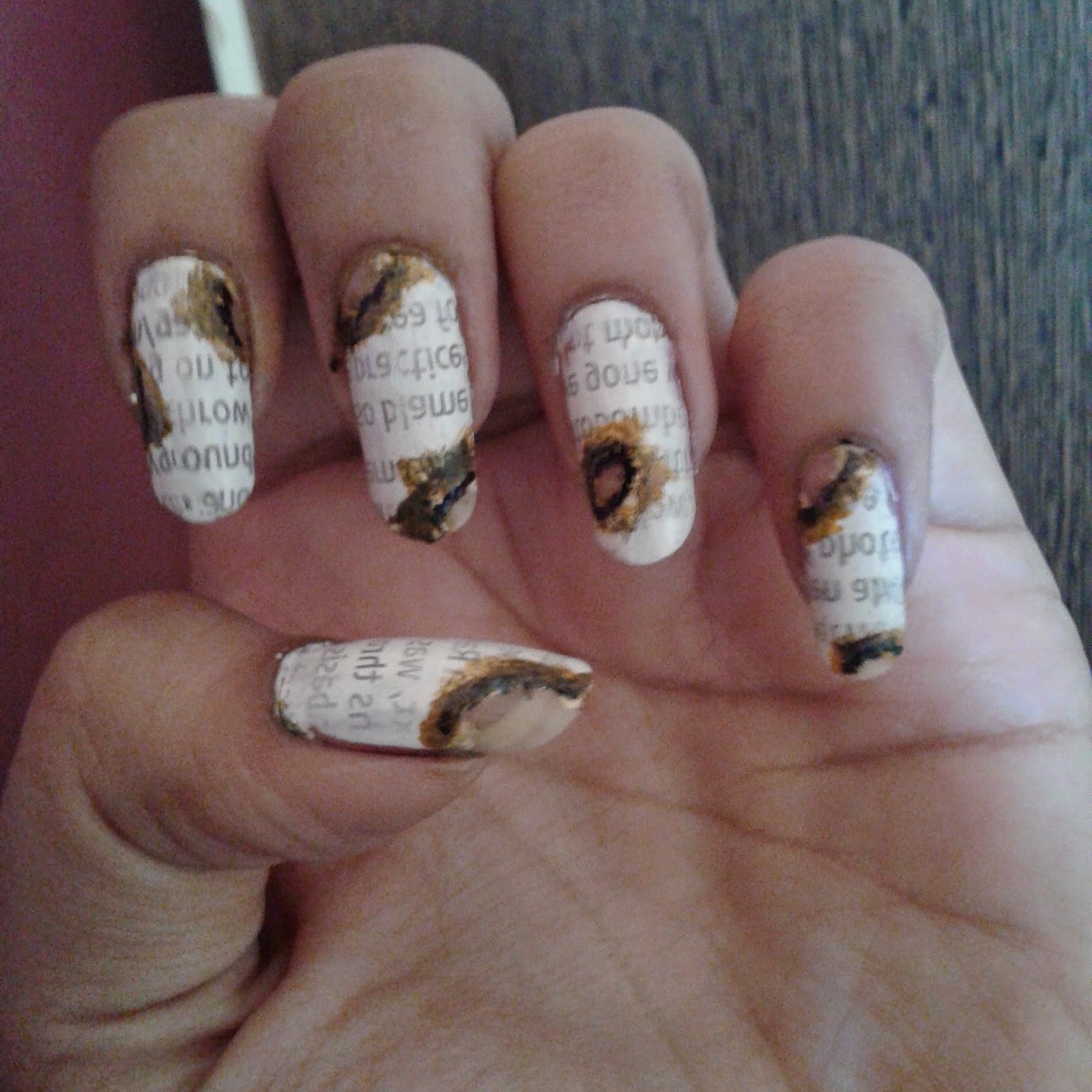NeW TrEnD-NaiL ArT..: Burnt Newspaper Nail Art